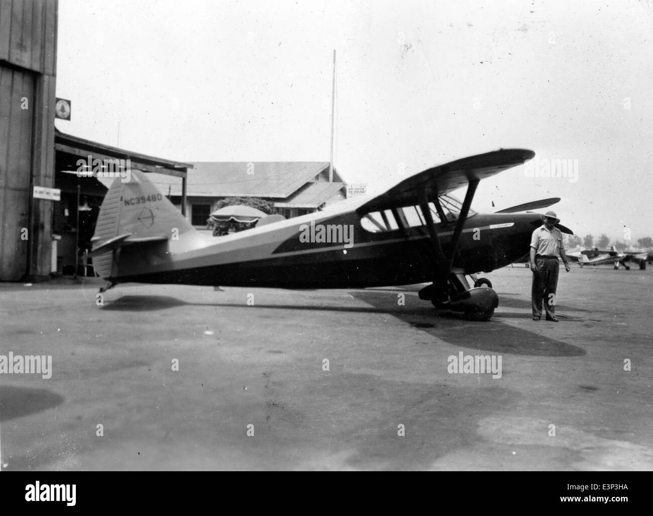 This image features a Stinson 108-2 aircraft, identified by its serial ...