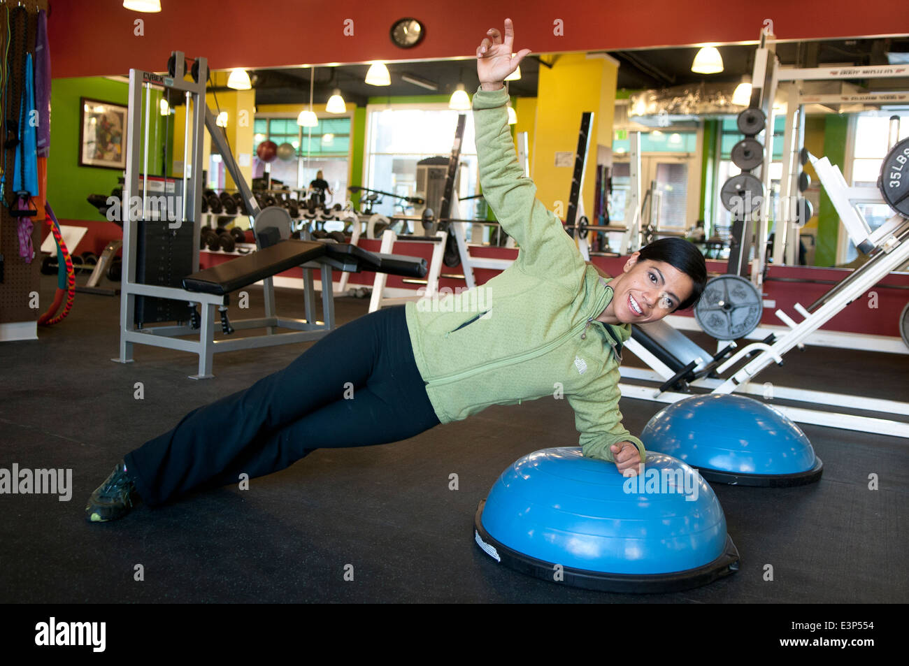 Seattle. Latina woman working out in gym. (MR Stock Photo - Alamy
