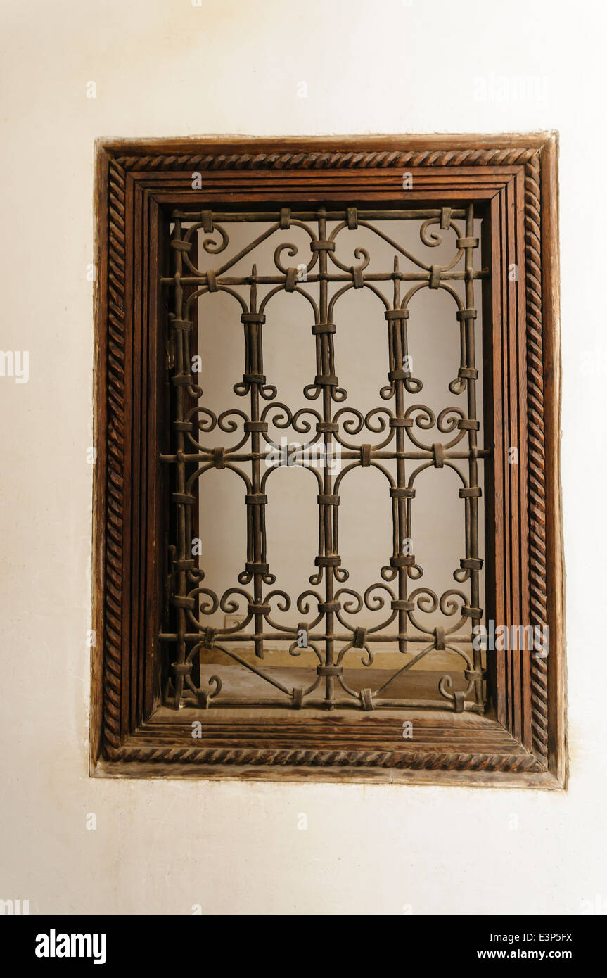 Wrought iron screen at a window of the Museum of Marrakech, Morocco ...