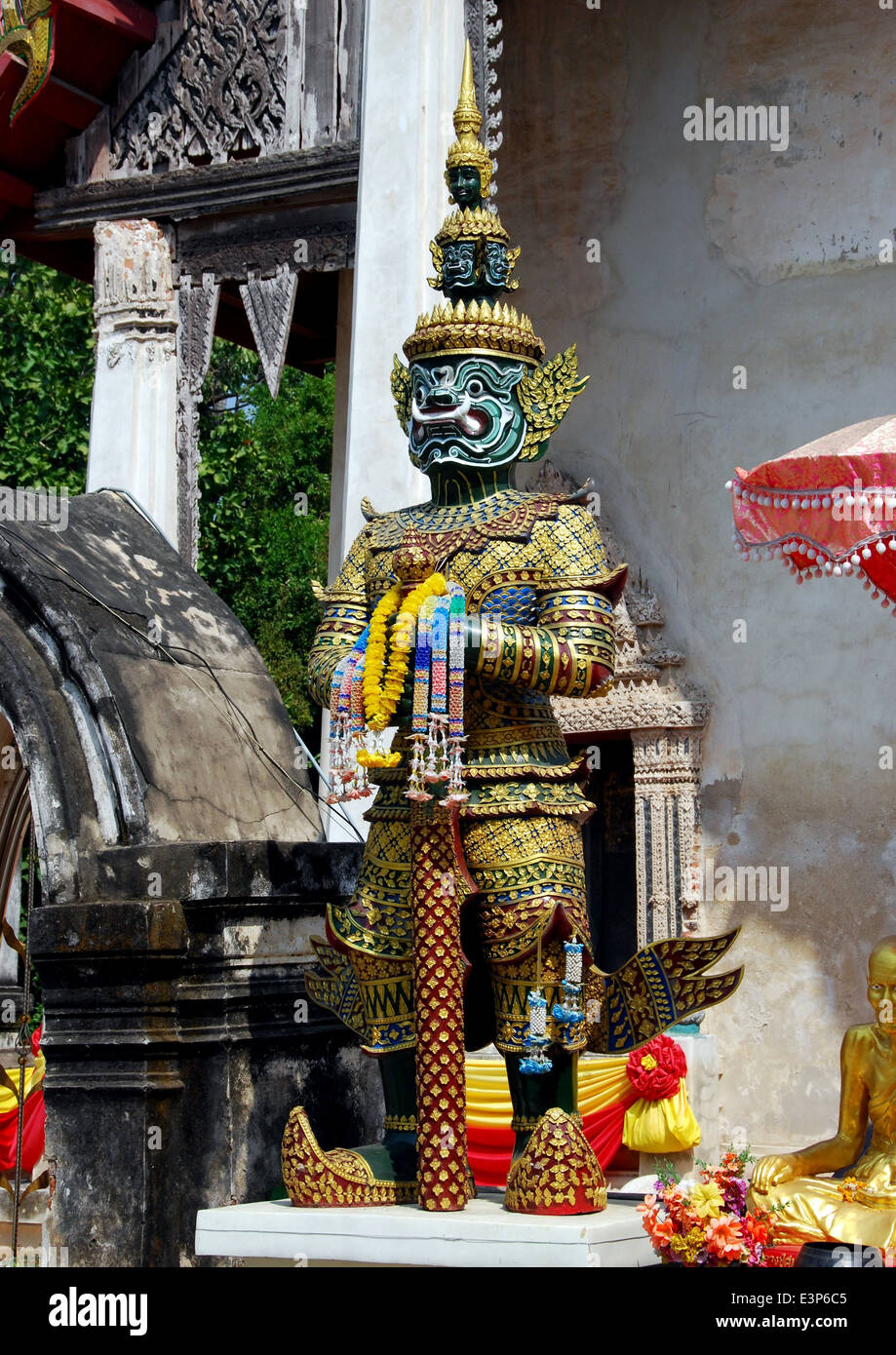 AYUTTHAYA, THAILAND: A giant green-faced Guardian demon stands at the ...