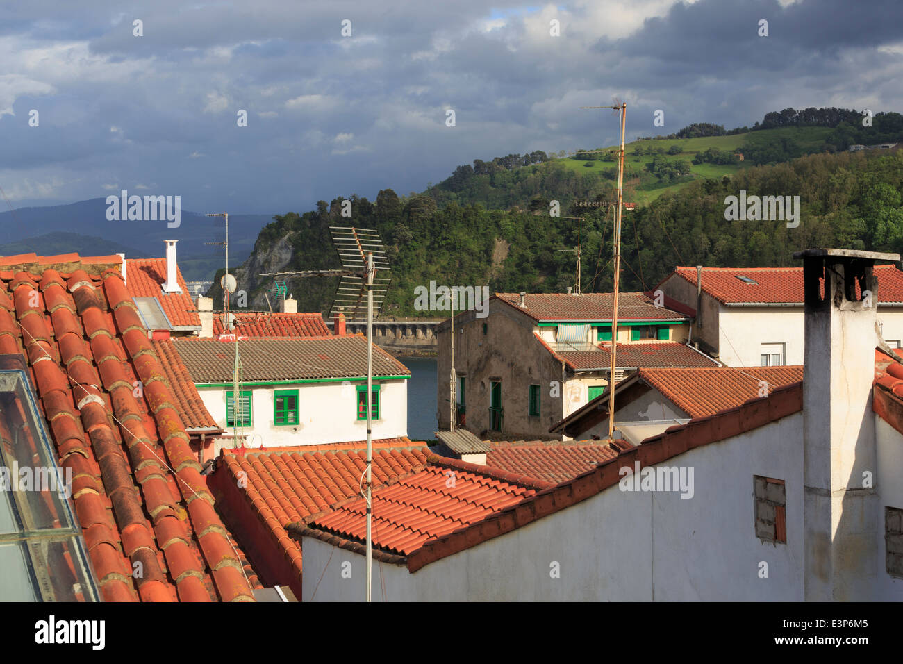Getaria, Gipuzkoa, Basque Country, Spain. Tiled roofs of the houses of ...