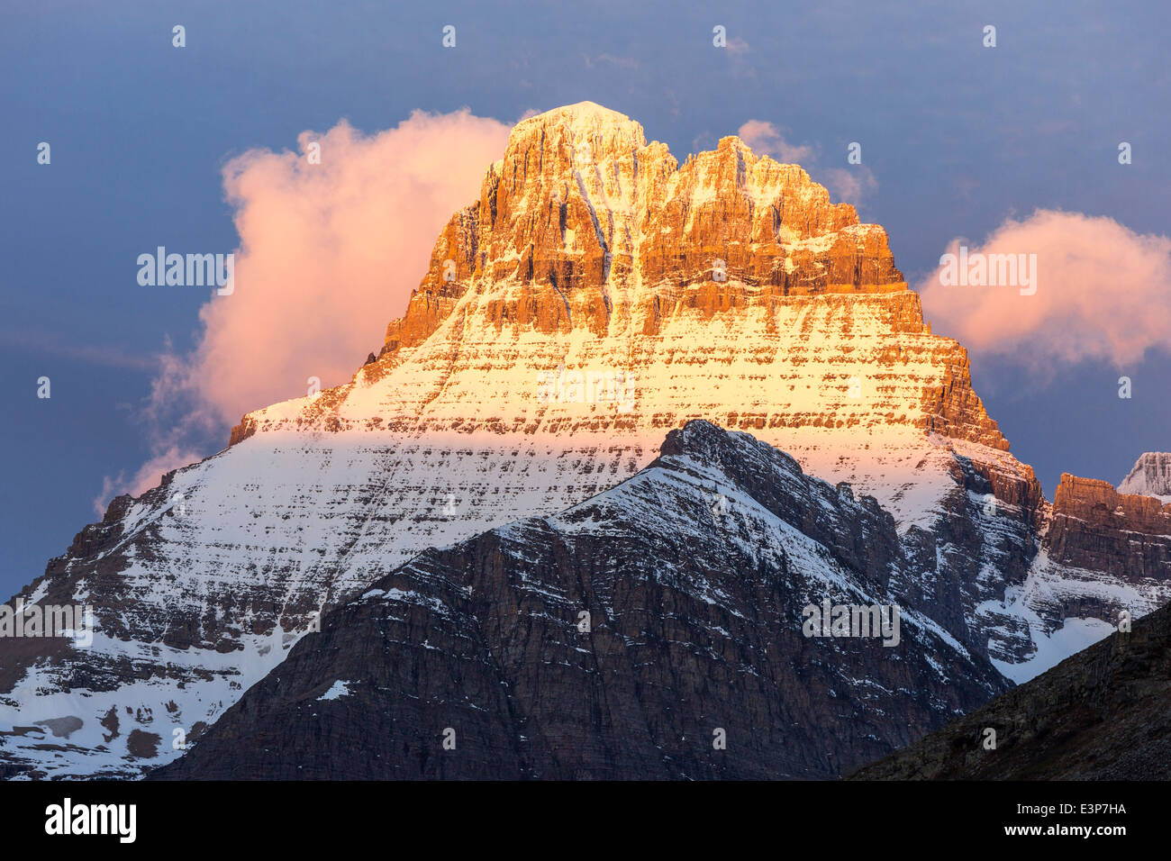 Sunrise clouds over Mount Wilbur in the Many Glacier Valley of Glacier ...