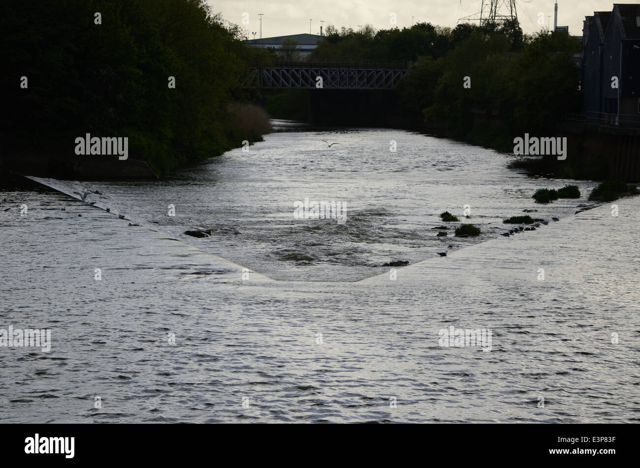 Small weir in river Stock Photo - Alamy