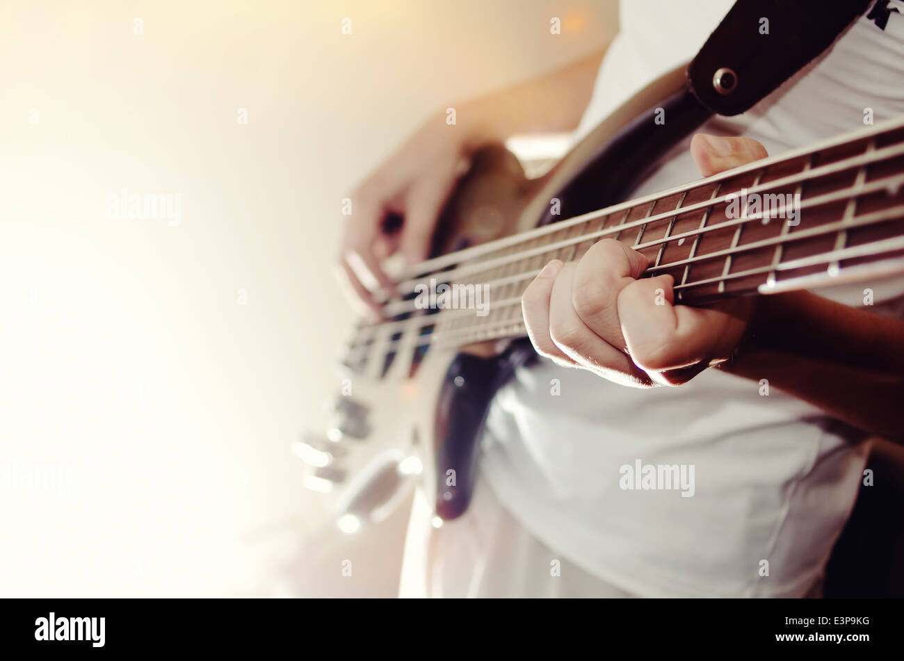 Bassist playing electric bass hi-res stock photography and images - Alamy
