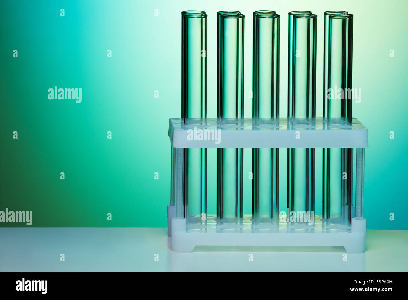 Empty test tubes organized and fixed in rows Stock Photo - Alamy