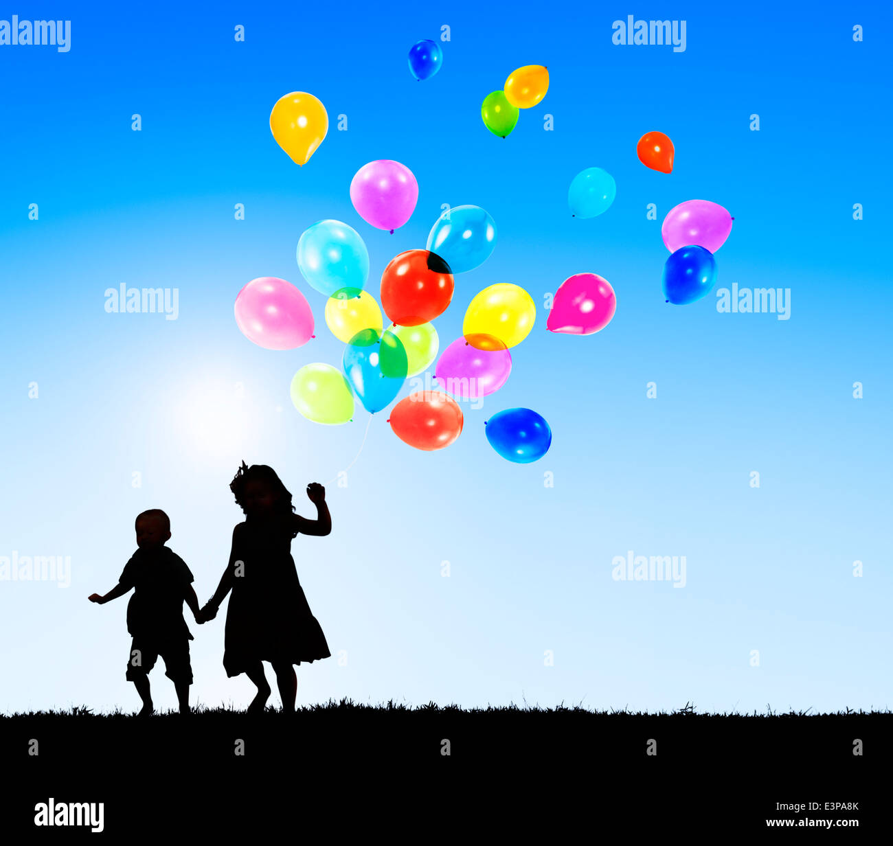 Two children playing balloons hi-res stock photography and images - Alamy
