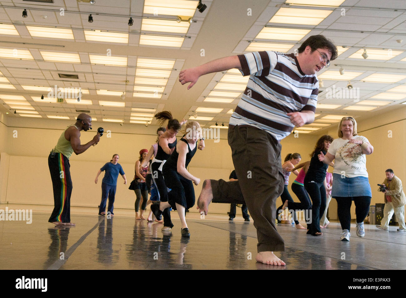 Seattle. Heavy man at indoor dance/exercise class Stock Photo - Alamy