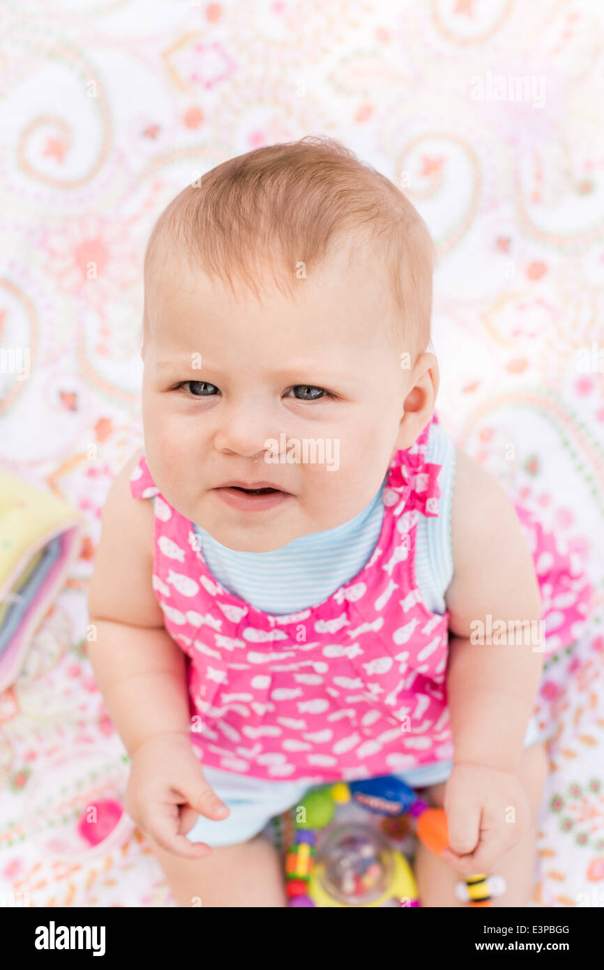 Cute baby girl playing on the blinket in the park Stock Photo - Alamy