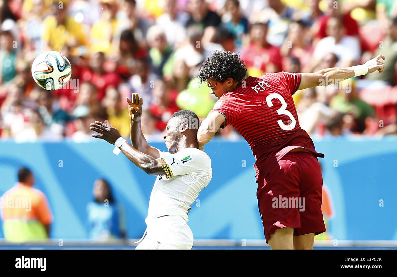 Brasilia, Brazil. 26th June, 2014. Portugal's Pepe (R) competes for a ...