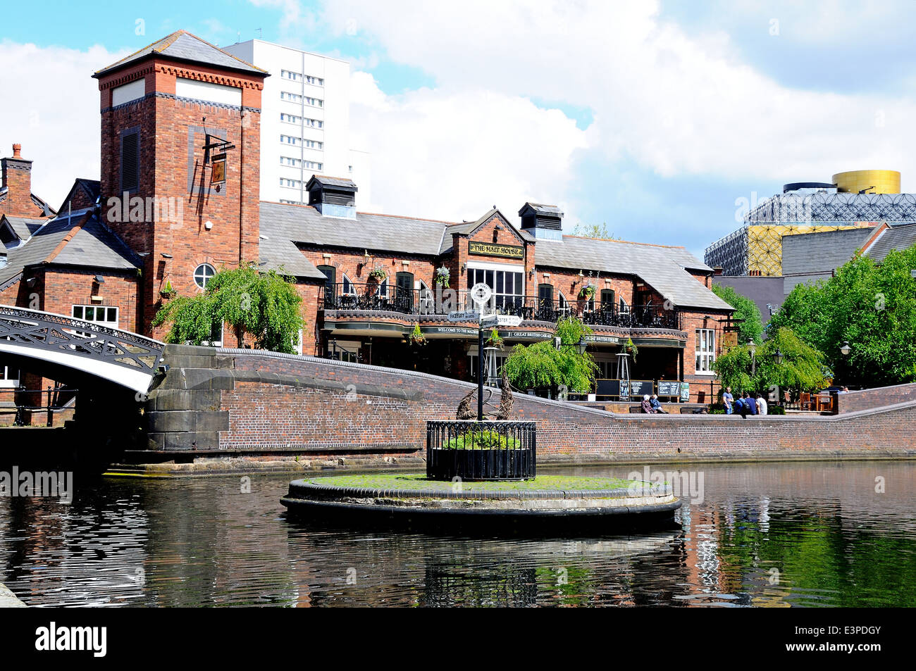 Island in centre of canal with fingerpost giving destinations with the ...