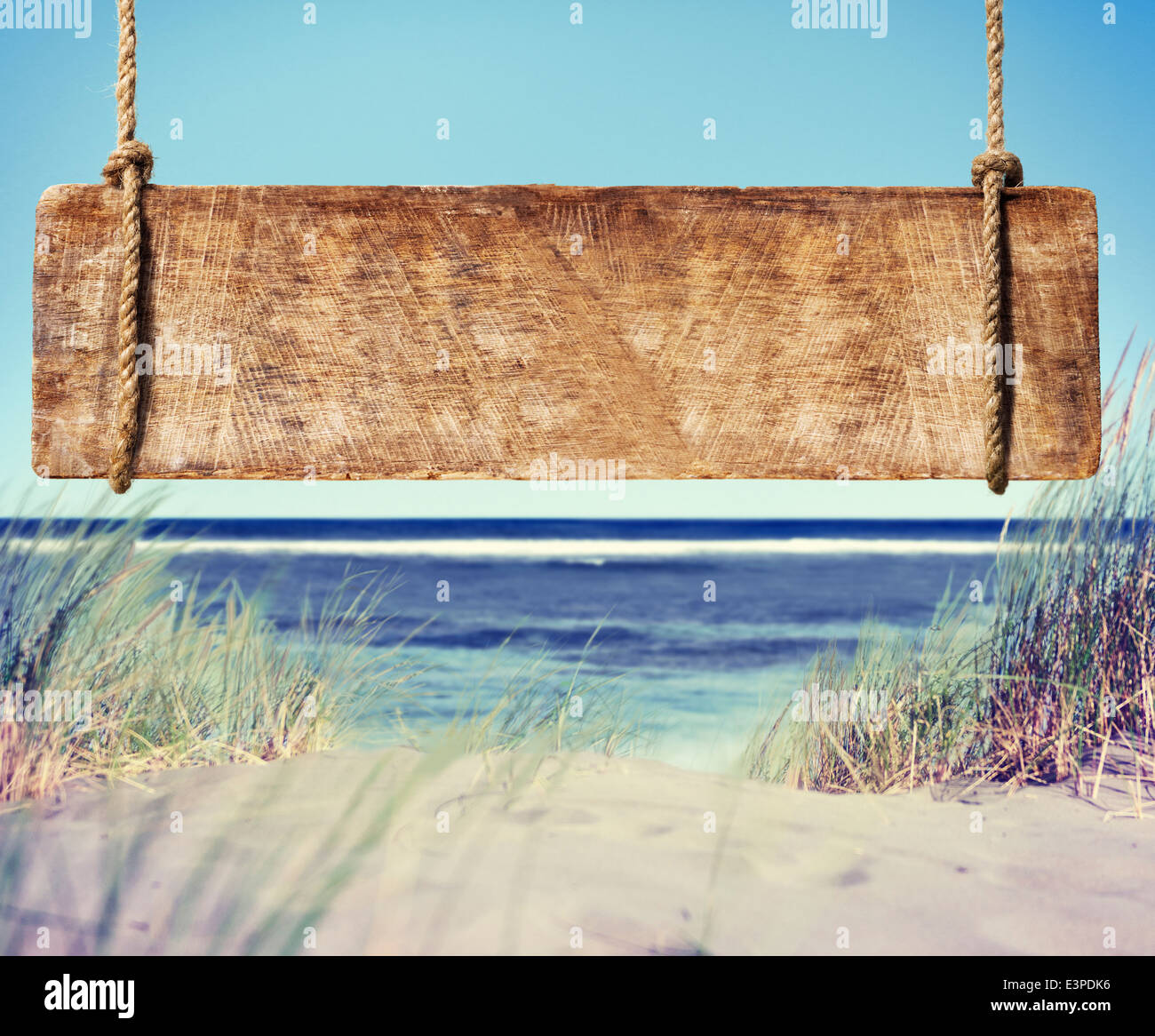 Beach with Empty Plank Sign Stock Photo - Alamy