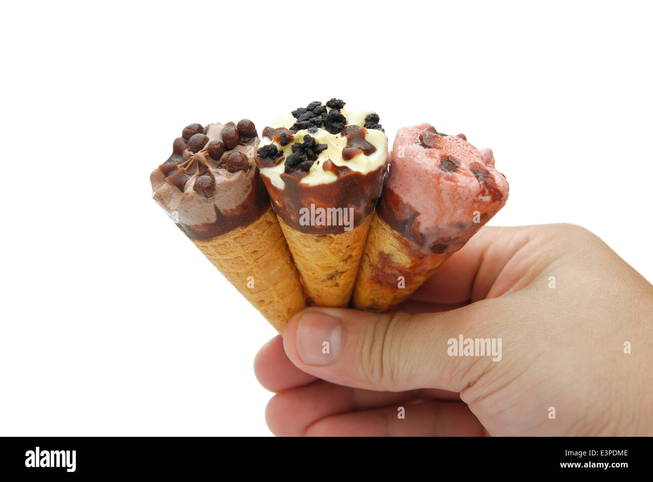 hand holding 3 funny size ice cream cones with clipping path Stock ...
