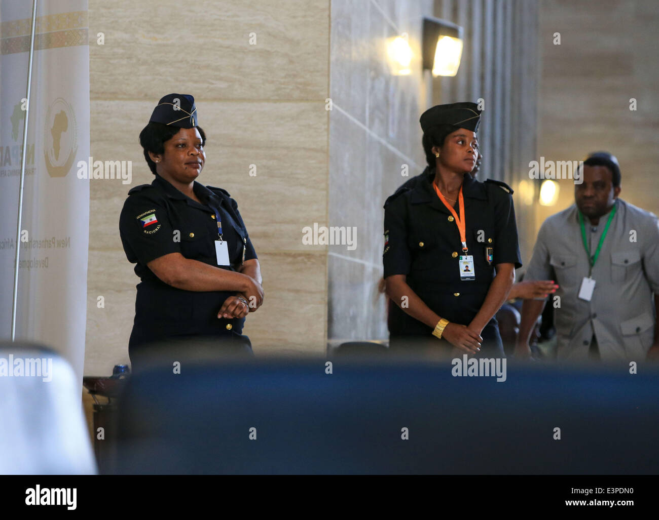 Malabo, Equatorial Guinea. 24th June, 2014. Two security guards work at ...