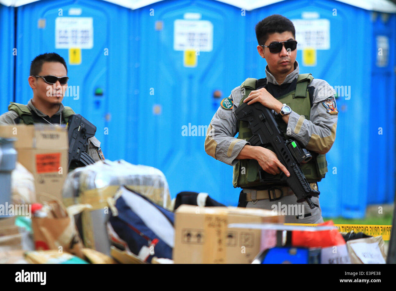 Cavite Province, Philippines. 25th June, 2014. Personnels of the ...