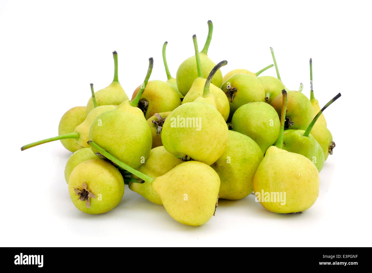 a pile of peras de San Juan, typical spanish small pears, on a white ...