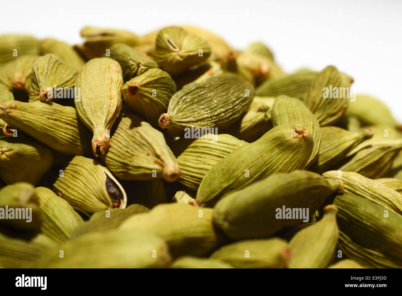 Close up of green cardamom pods Stock Photo - Alamy