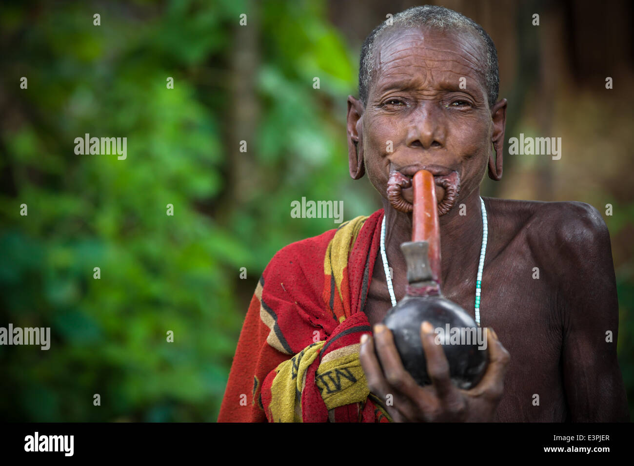 Lip plates hi-res stock photography and images - Alamy