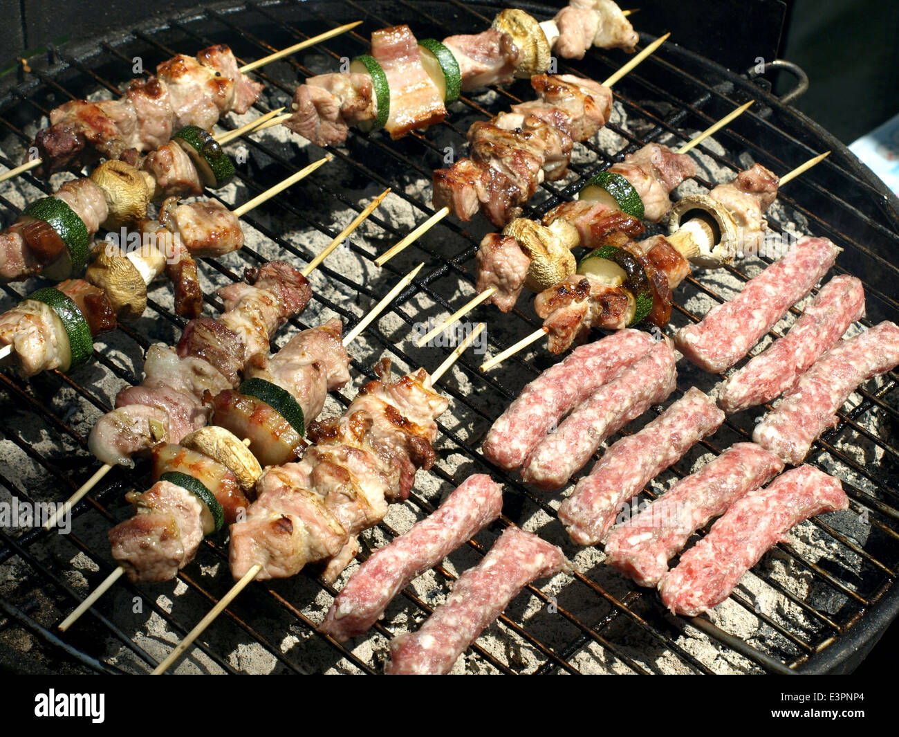 mixed meat on the grill Stock Photo - Alamy