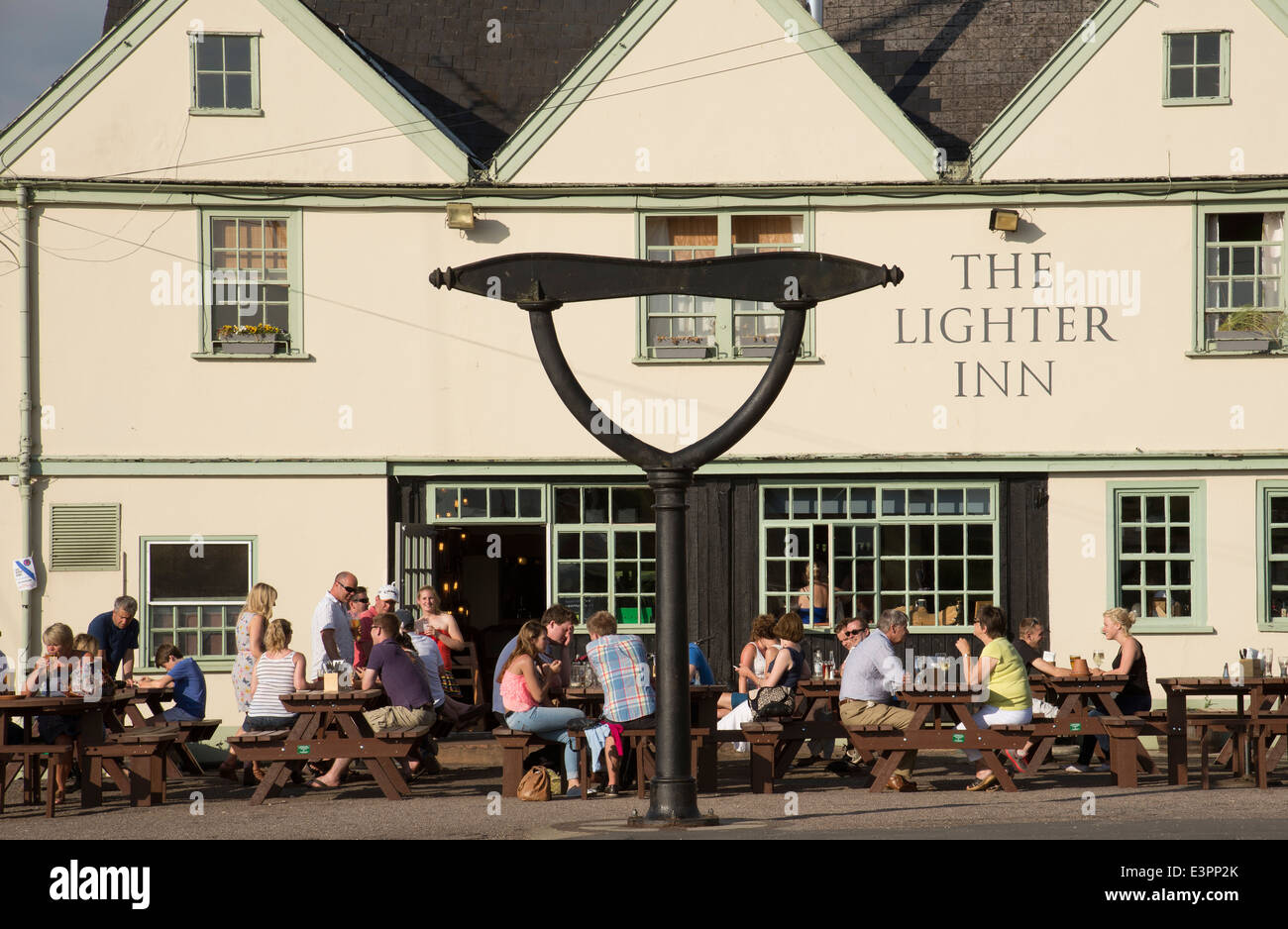 Customers drinking at The Lighter Inn at Topsham a historic port in ...