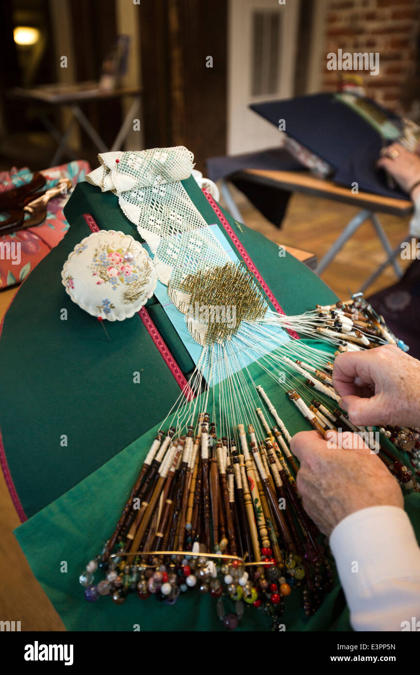 UK England, Suffolk, Lavenham, Market Square, Guildhall, hands of ...