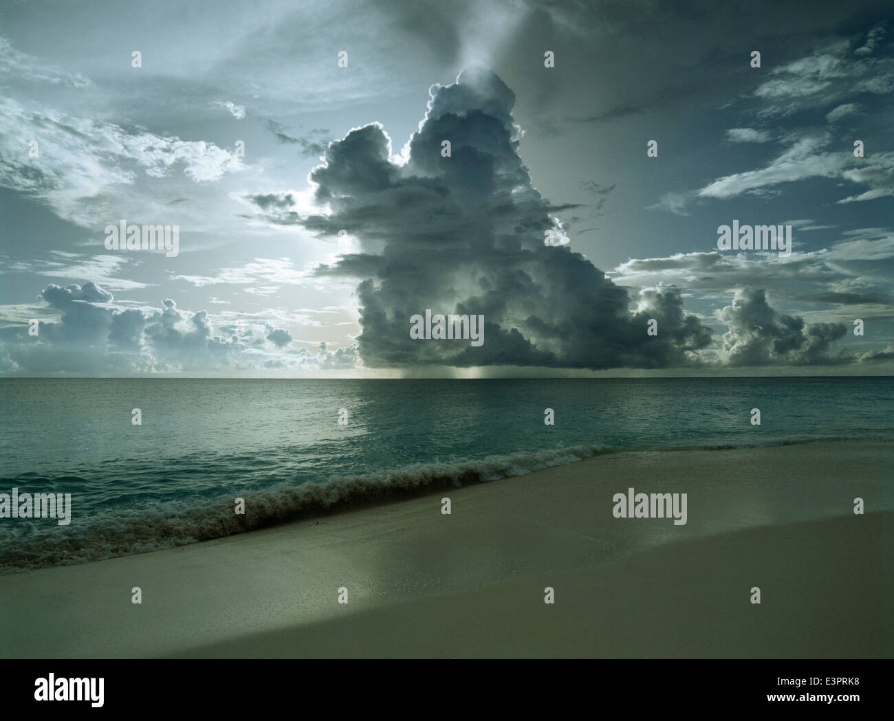 Storm clouds at sunset over the Indian ocean. Fregate Island ...