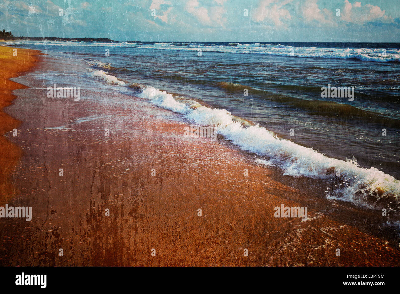 Vintage retro hipster style travel image of wave surging on sand on ...
