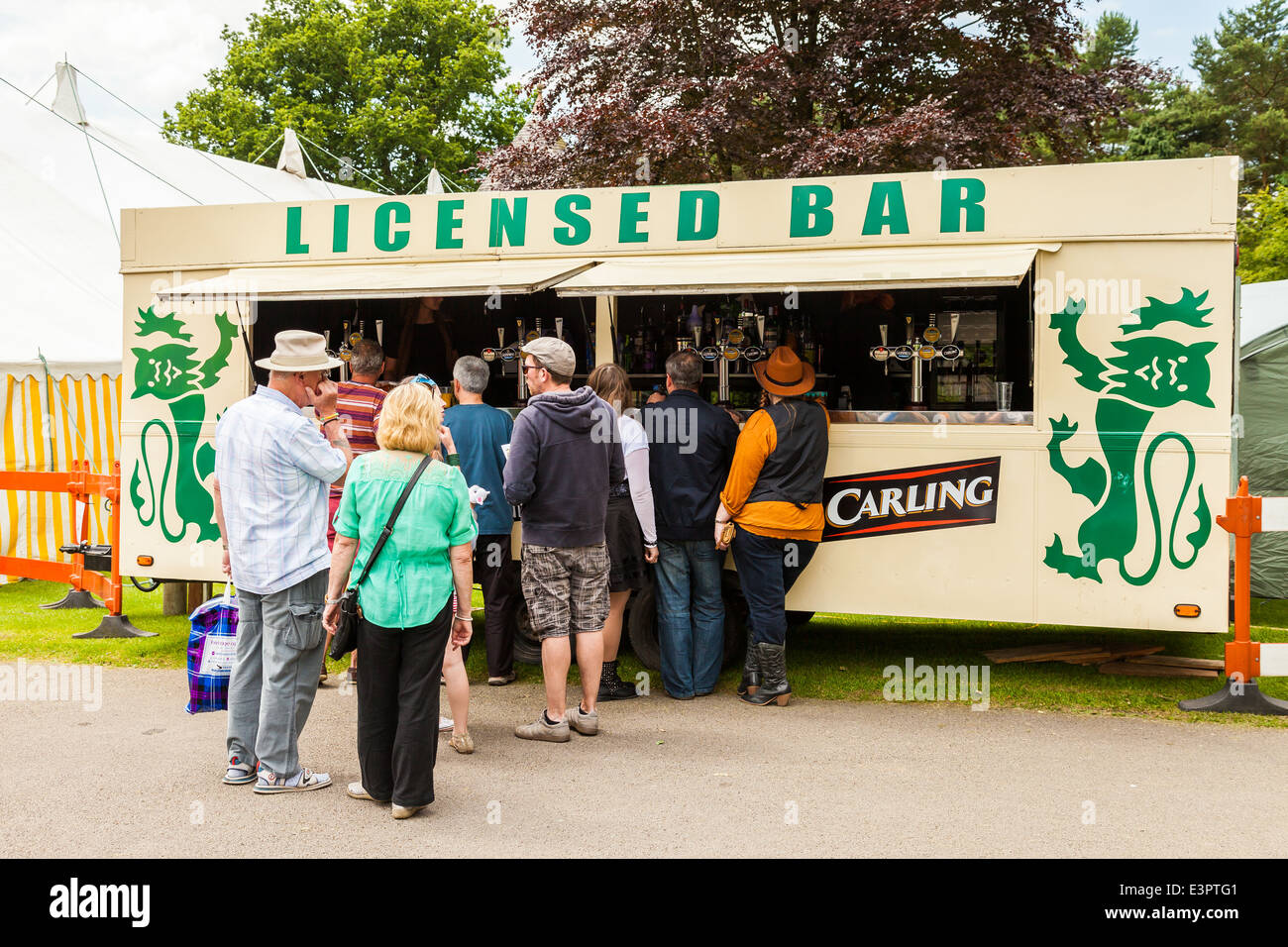 UK , England Leek, Staffordshire. People queuing outside mobile ...