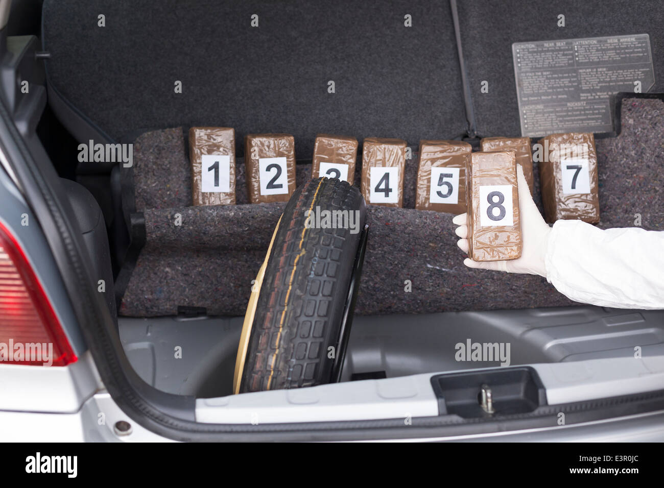 drug smuggled in a car trunk Stock Photo - Alamy
