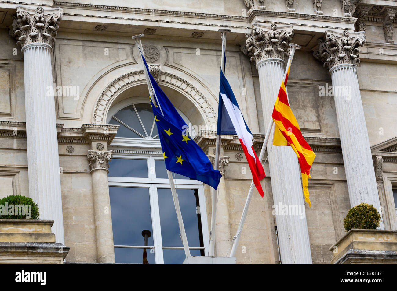 Flags on the Hotel de Ville (town Hall) in Avignon, Provence, France ...