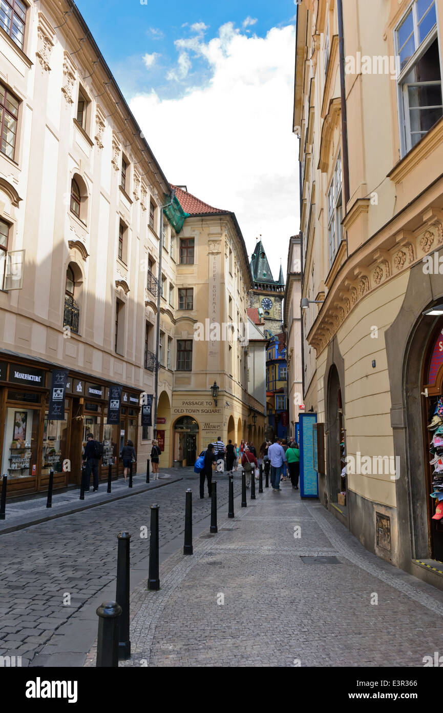 A traditional narrow street with cobblestone between buildings, Prague ...