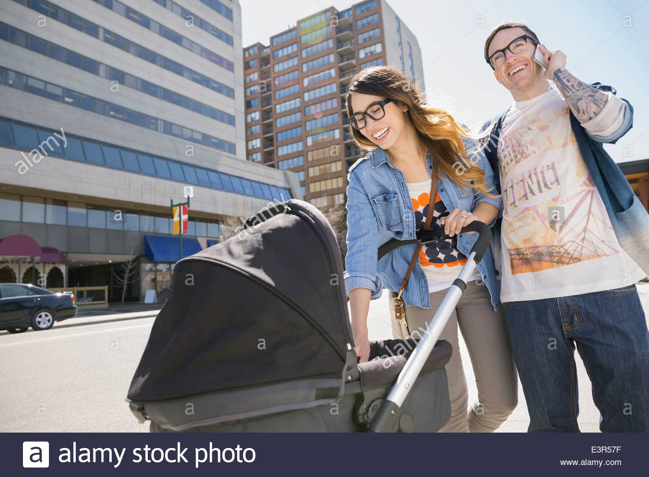 Father pushing pram hi-res stock photography and images - Alamy