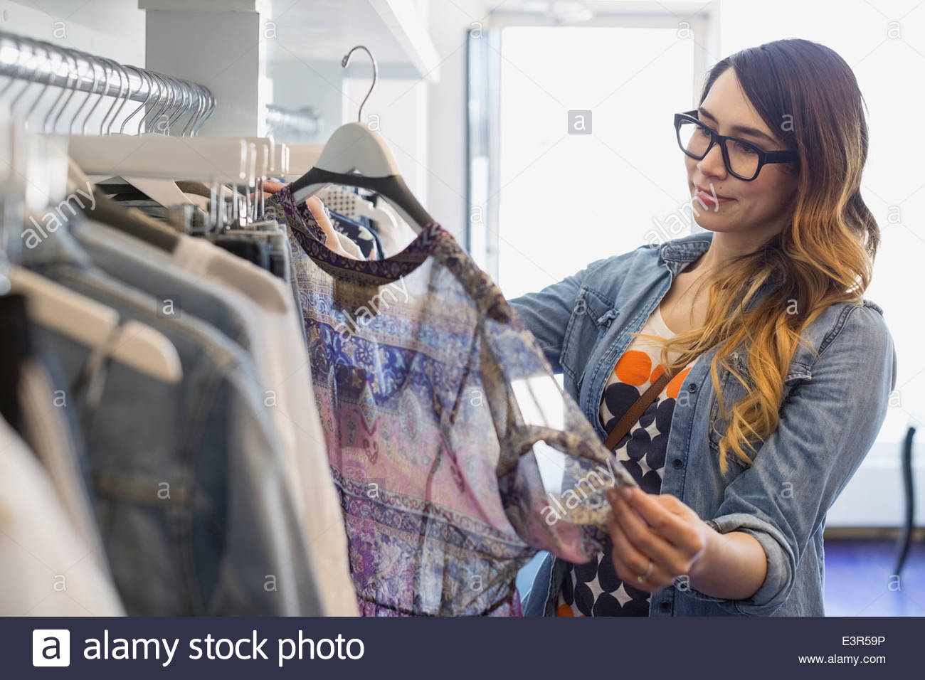 Clothing rack looking retail High Resolution Stock Photography and ...