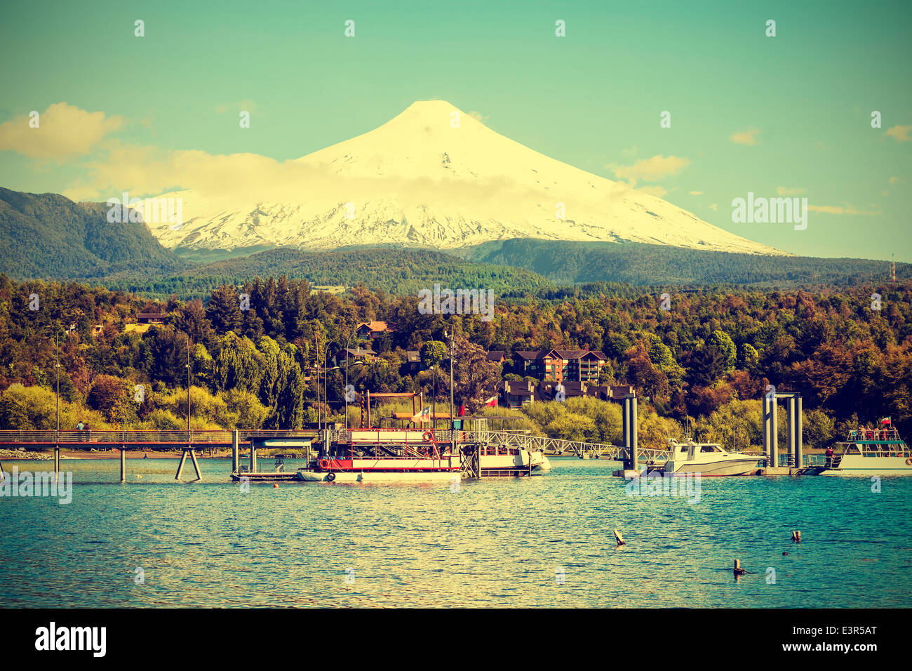 Snow covered Volcano Villarica, Chile, vintage retro style Stock Photo ...
