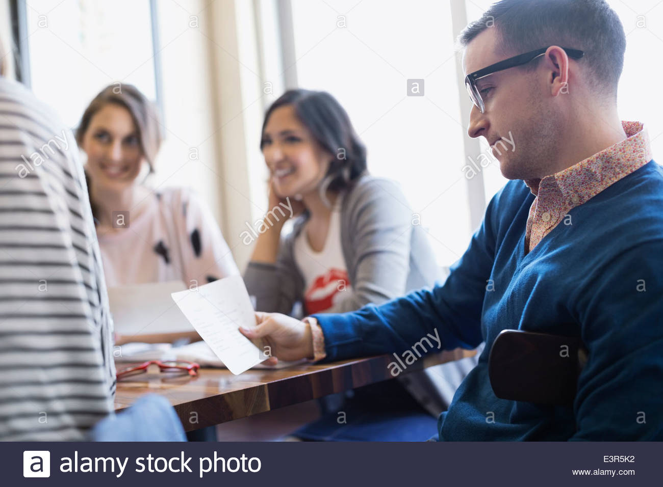 Man menu restaurant looking hi-res stock photography and images - Alamy