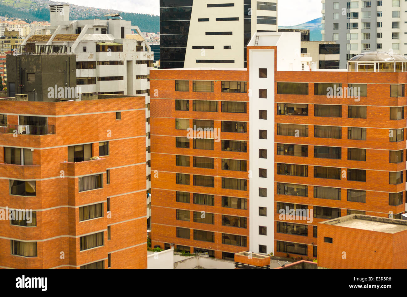 white and orange brick buildings in city Stock Photo - Alamy
