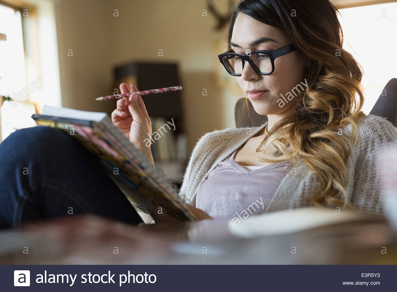 Woman writing with pencil hi-res stock photography and images - Alamy