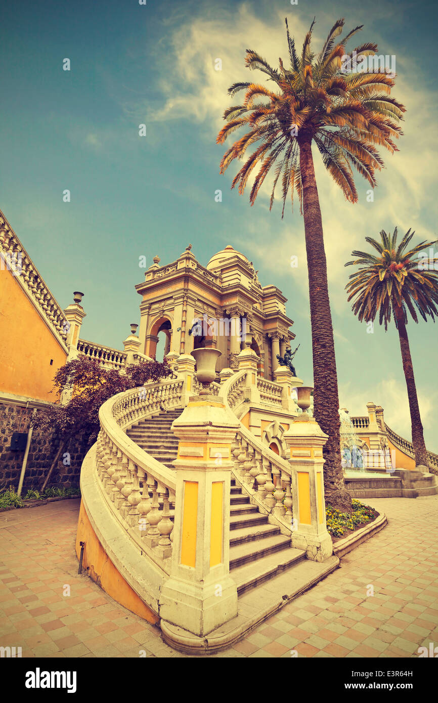 Santiago de Chile, old building with palms on the blue sky, vintage ...