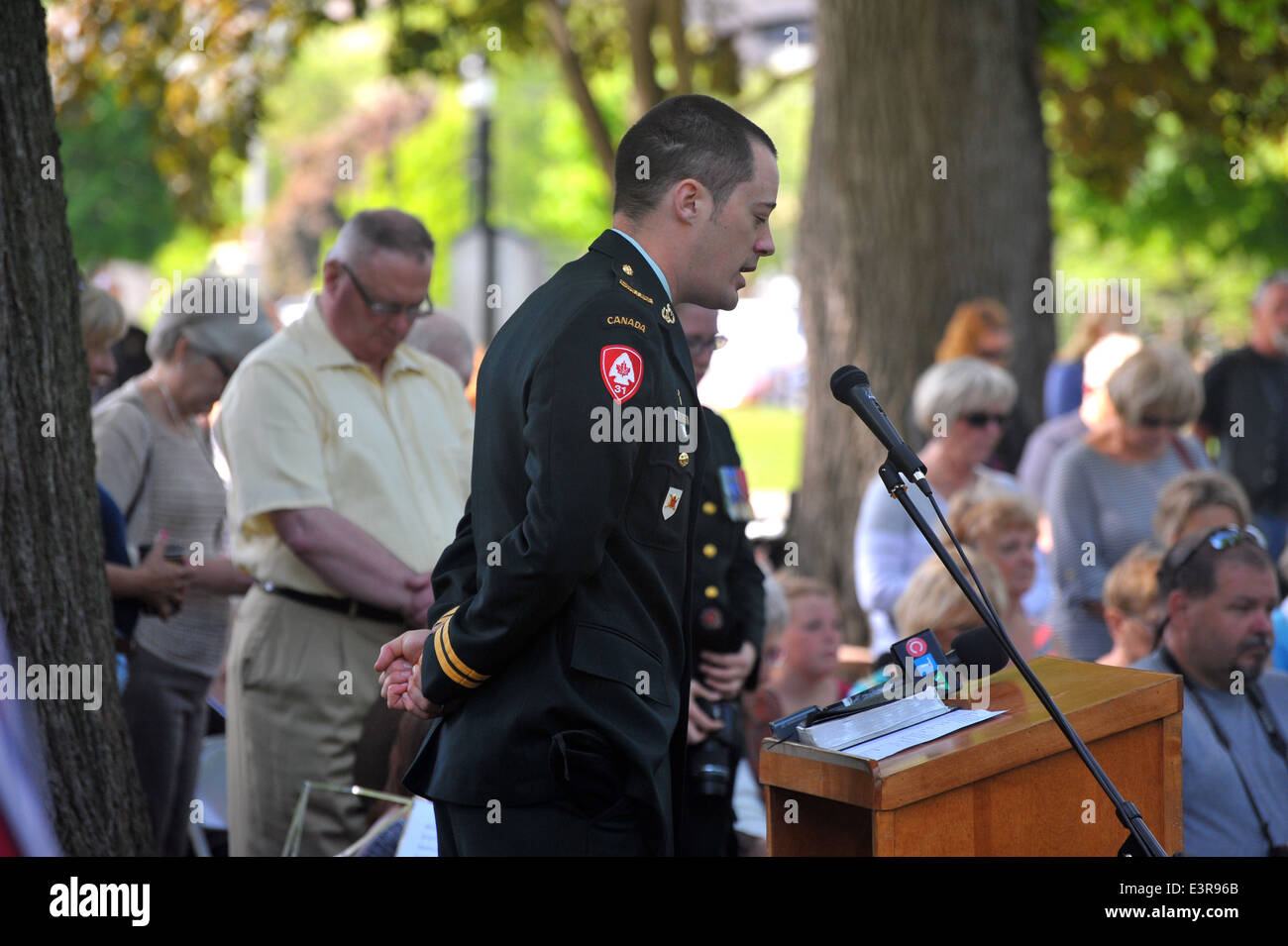 Politicians, members of the public, veterans and serving military ...