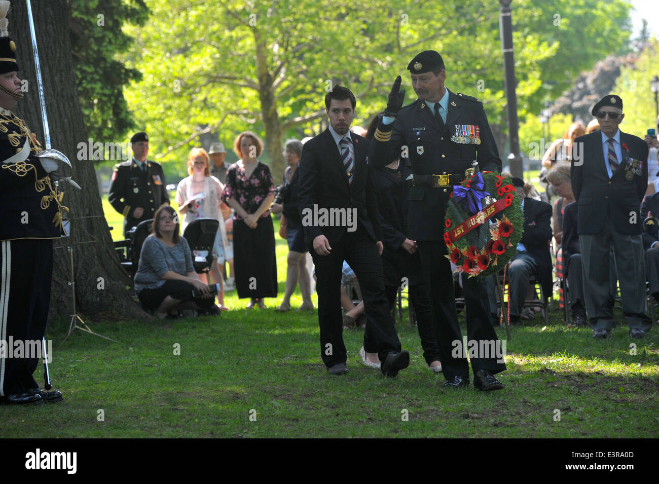 Politicians, members of the public, veterans and serving military ...