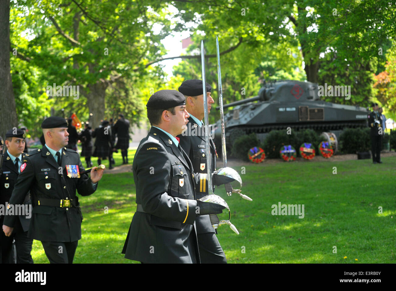 Politicians, members of the public, veterans and serving military ...