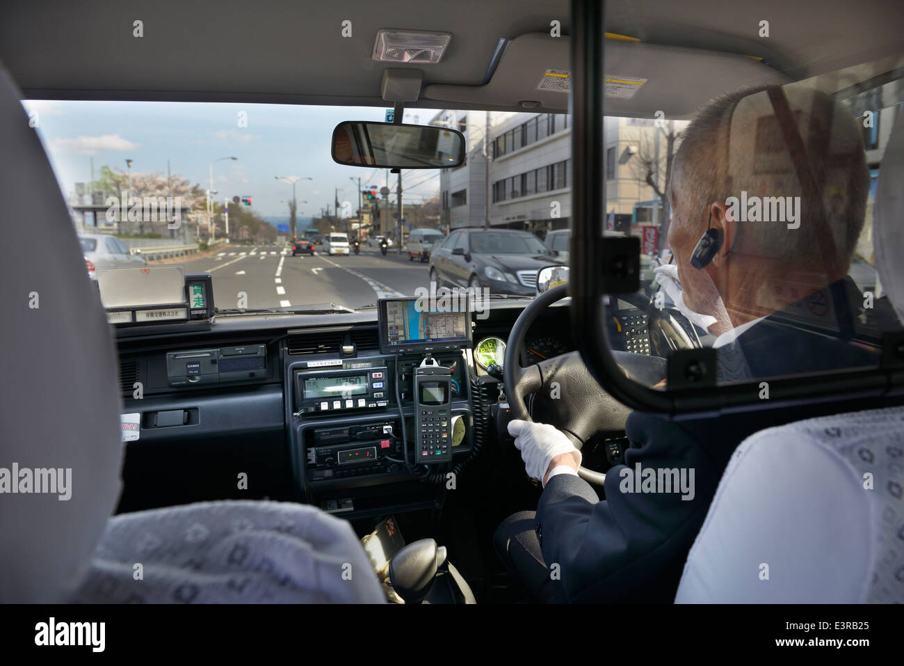 Taxi cab driver at a steering wheel. Kyoto, Japan Stock Photo - Alamy