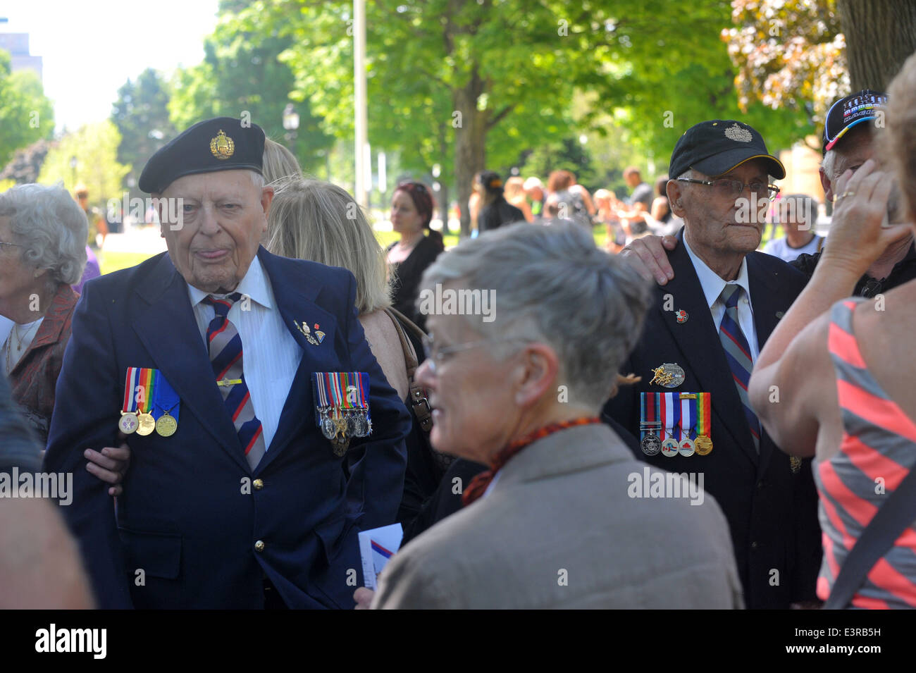 Politicians, members of the public, veterans and serving military ...