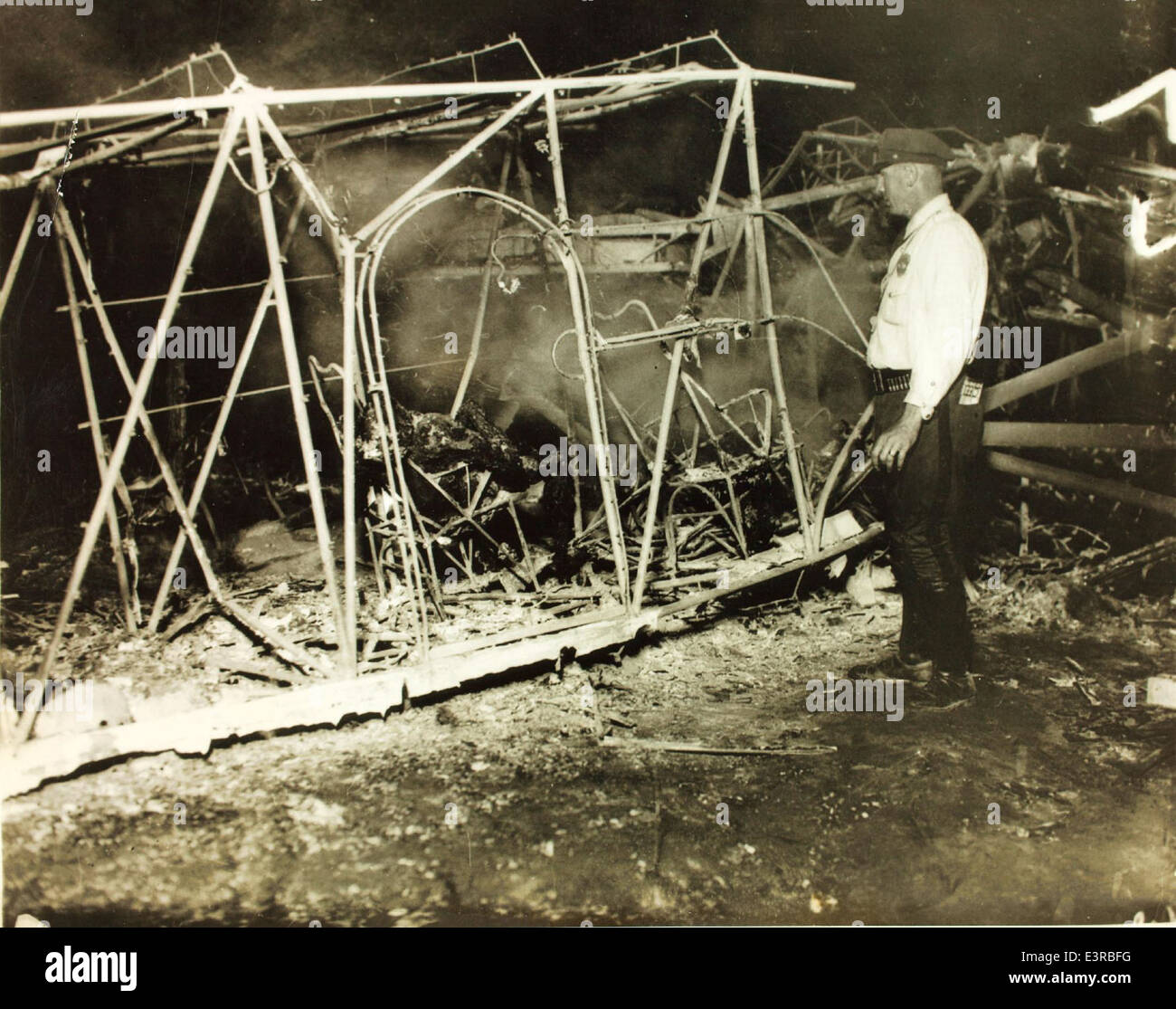 This photograph documents the aftermath of an aircraft accident ...
