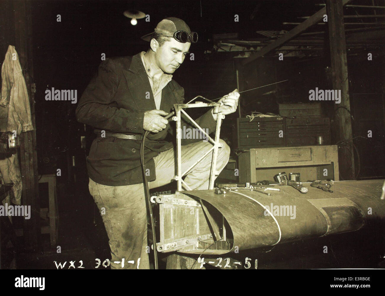 Photograph documenting an aircraft accident, featuring an investigation ...