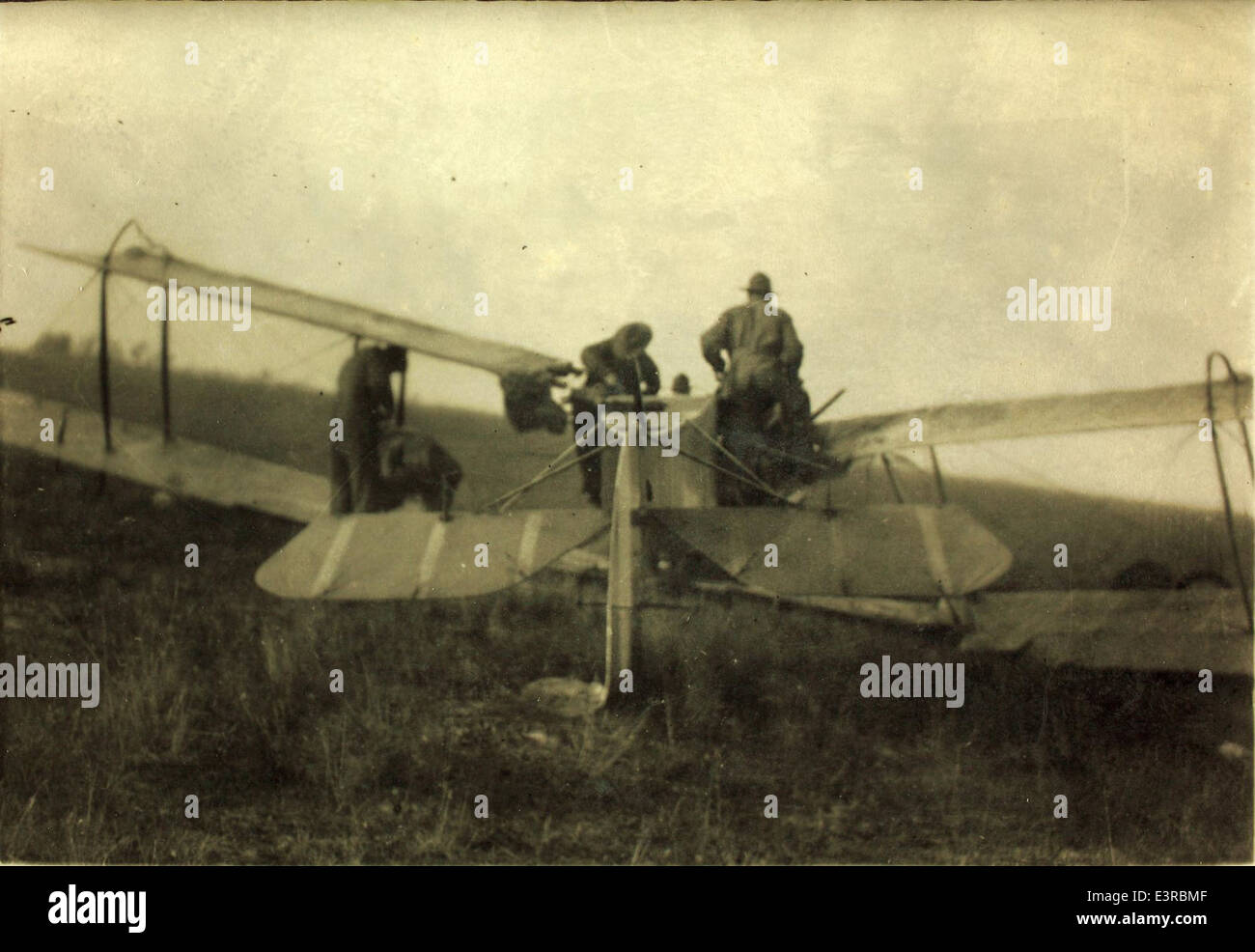 This image shows a Curtiss JN-4 biplane involved in an aircraft ...