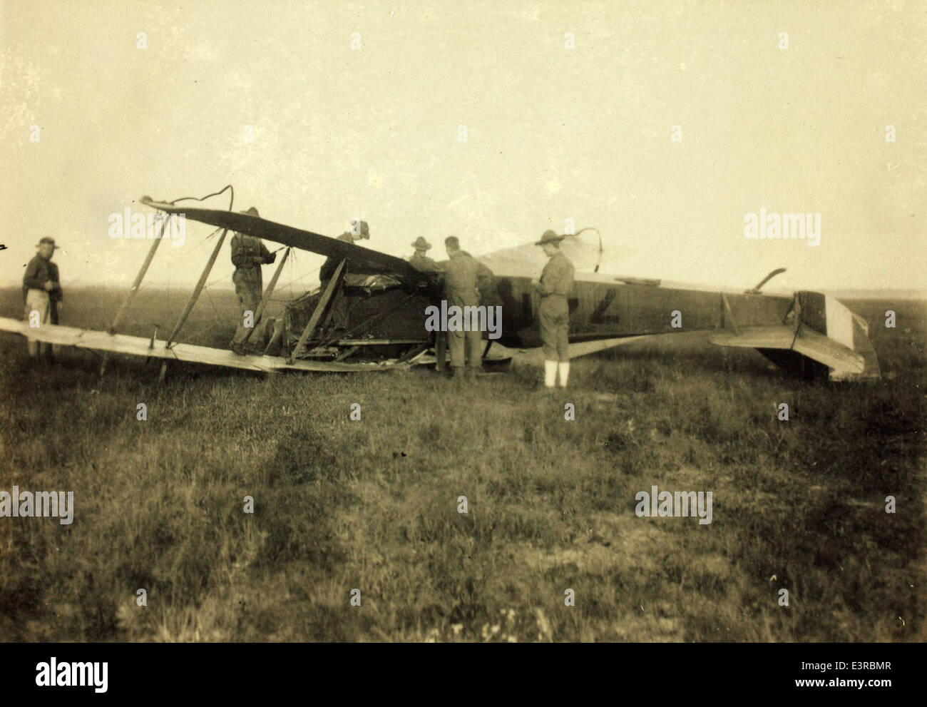 This photograph depicts the aftermath of a 1919 aircraft accident ...