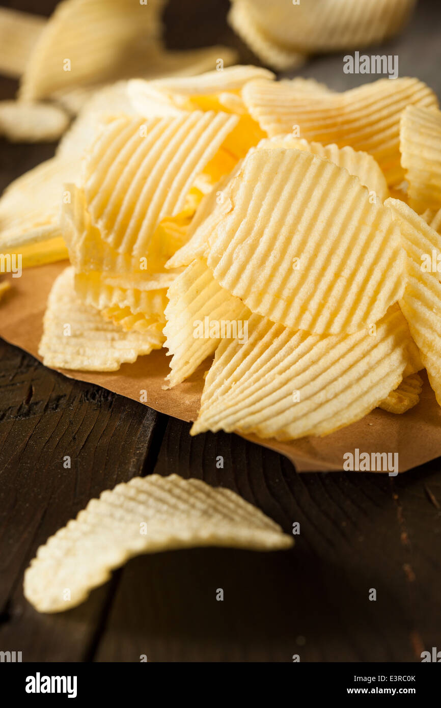 Unhealthy Crinkle Cut Potato Chips Ready to Eat Stock Photo - Alamy