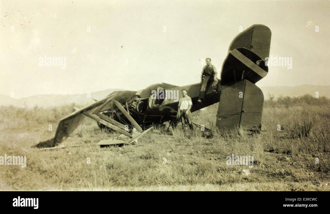This image captures the aftermath of an airmail aircraft crash. The ...