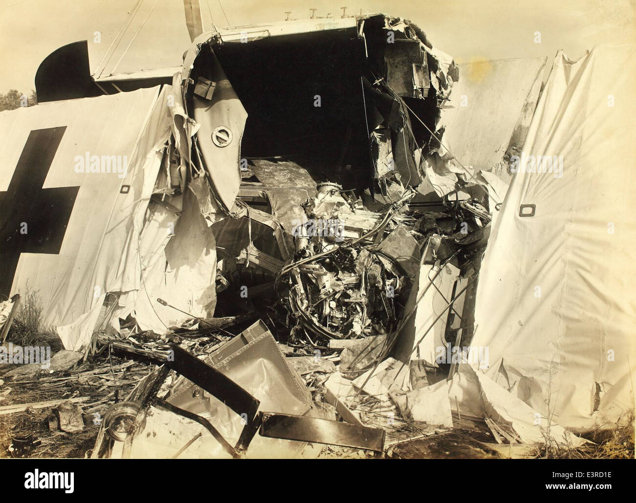 This image captures the aftermath of an airmail aircraft crash ...