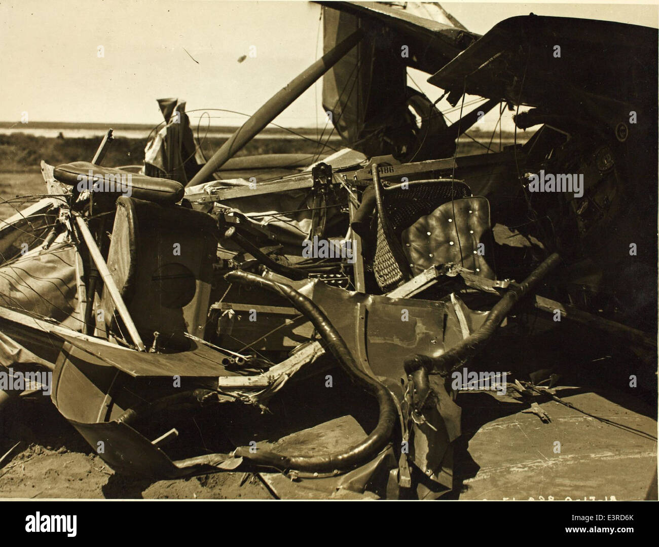This photo documents an aircraft accident between 1917 and 1920. It ...